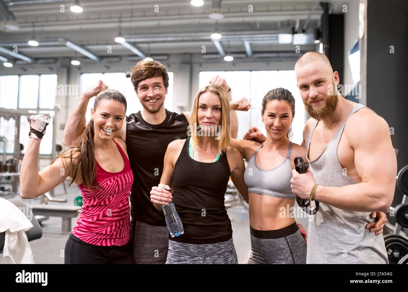 Fit friends having fun in gym Stock Photo - Alamy