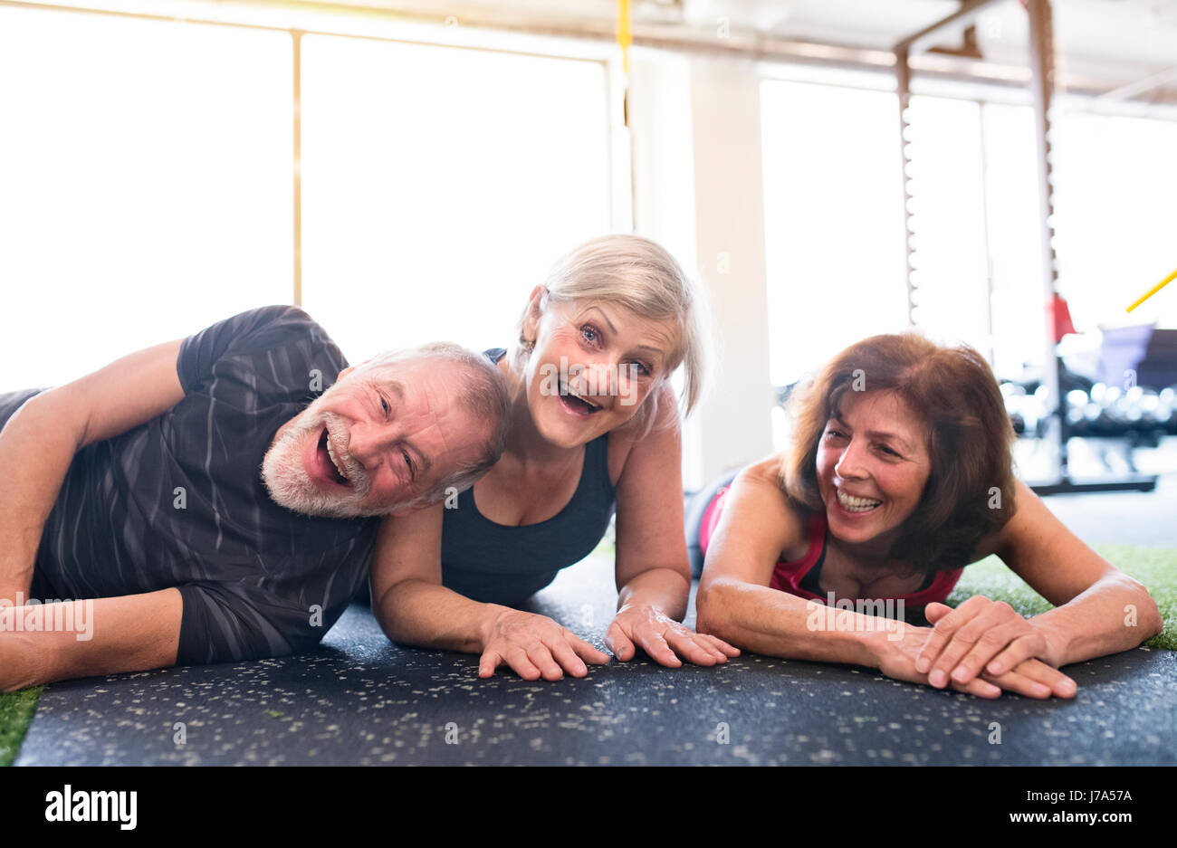 Senior friends having fun in gym Stock Photo - Alamy