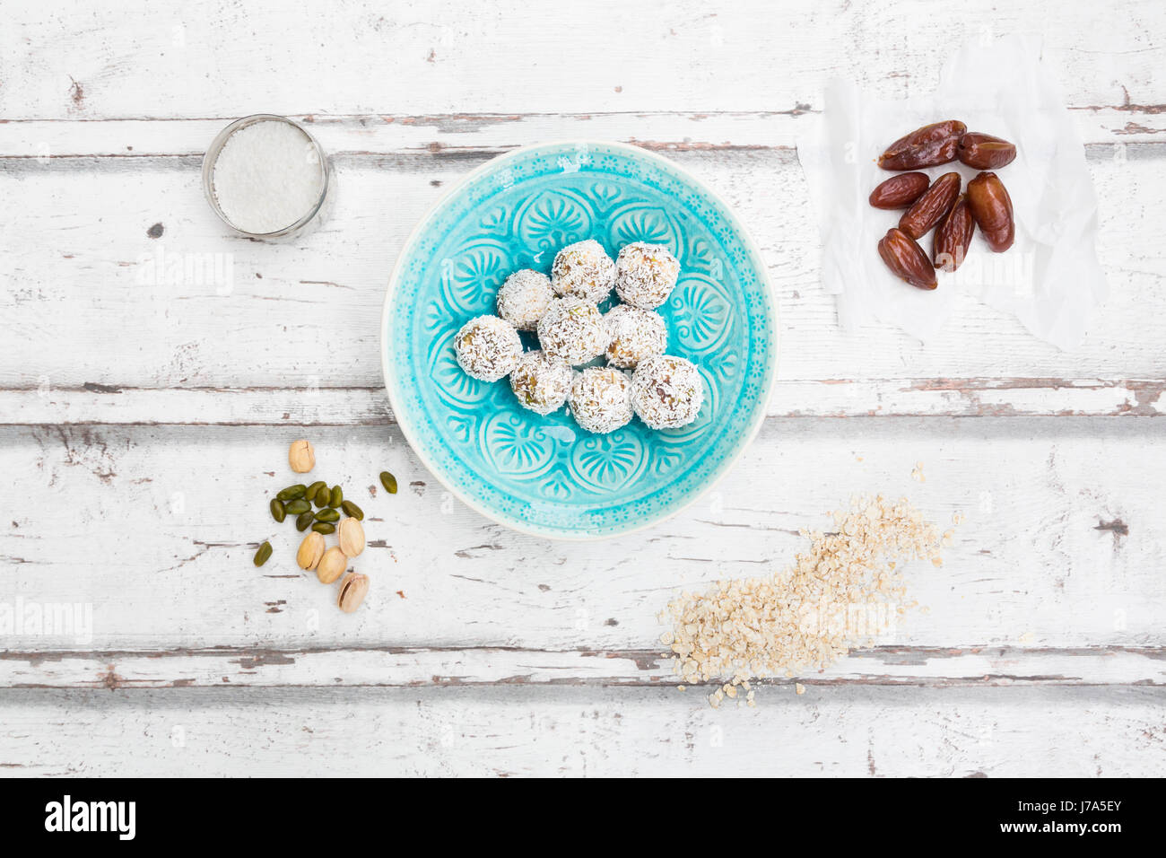 Bliss Balls with dates, pistachio, oat flakes and coconut flakes Stock ...