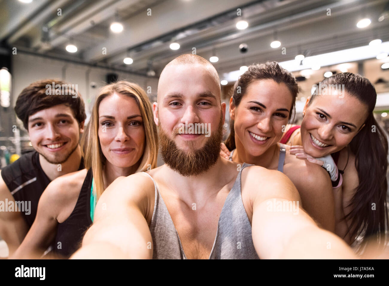 Young athletes having fun in the gym, taking selfies Stock Photo - Alamy