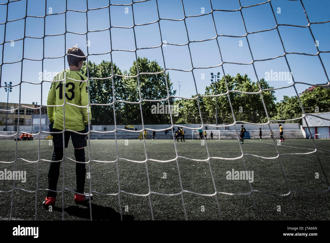 Boy as soccer goalkeeper Stock Photo - Alamy