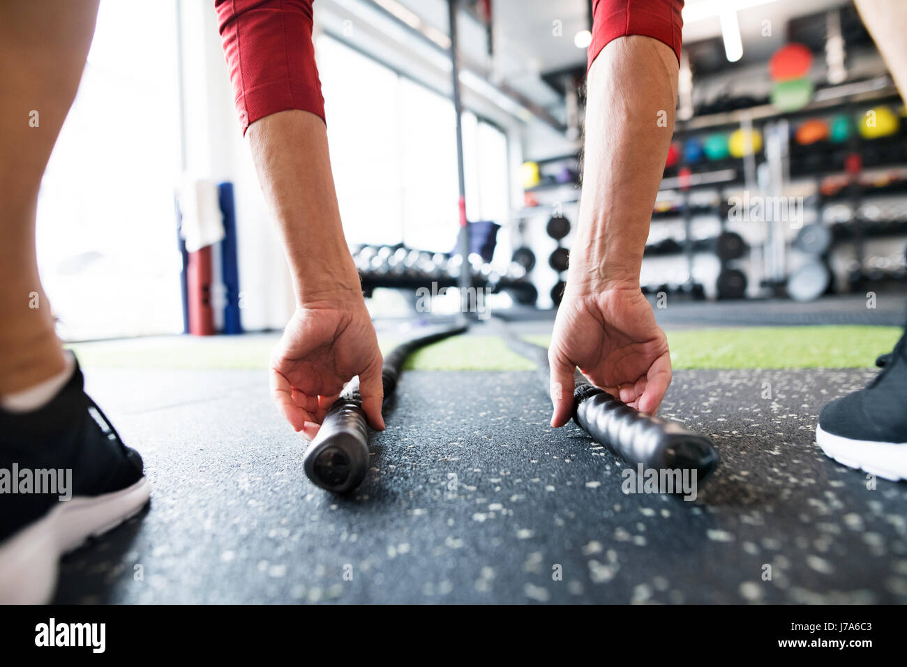 Exercising battle ropes person in hi-res stock photography and images ...