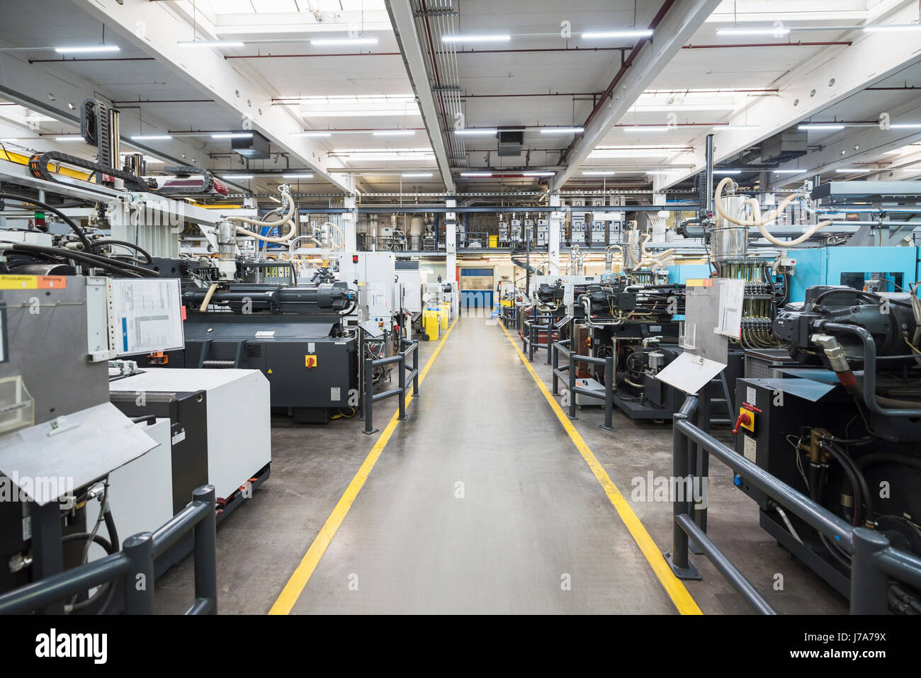 Machines on factory shop floor Stock Photo - Alamy