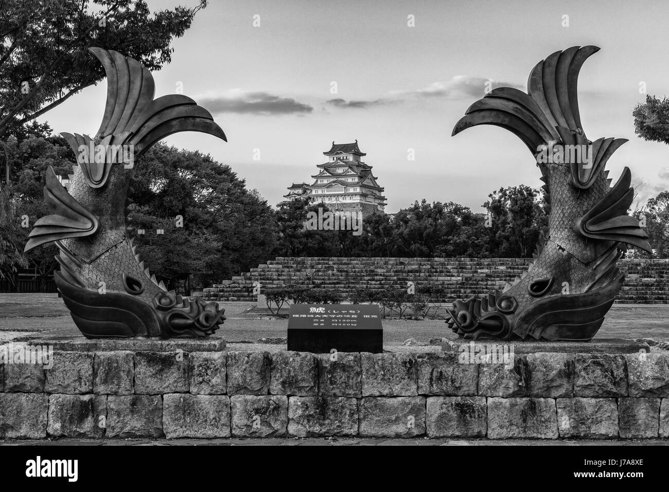 Black and white photo of two fish sculptures with dragon heads and the ...