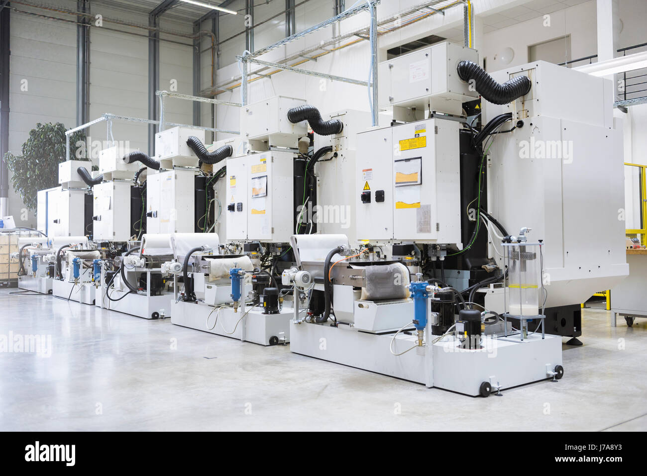 Machines on factory shop floor Stock Photo - Alamy