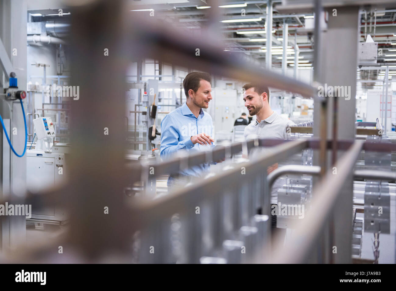 Business men talking progress company hi-res stock photography and ...