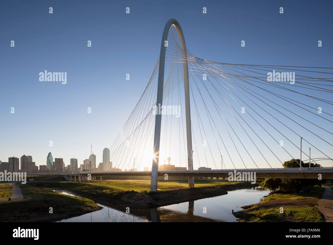 USA, Texas, Dallas, Margaret Hunt Hill Bridge and skyline at sunrise ...