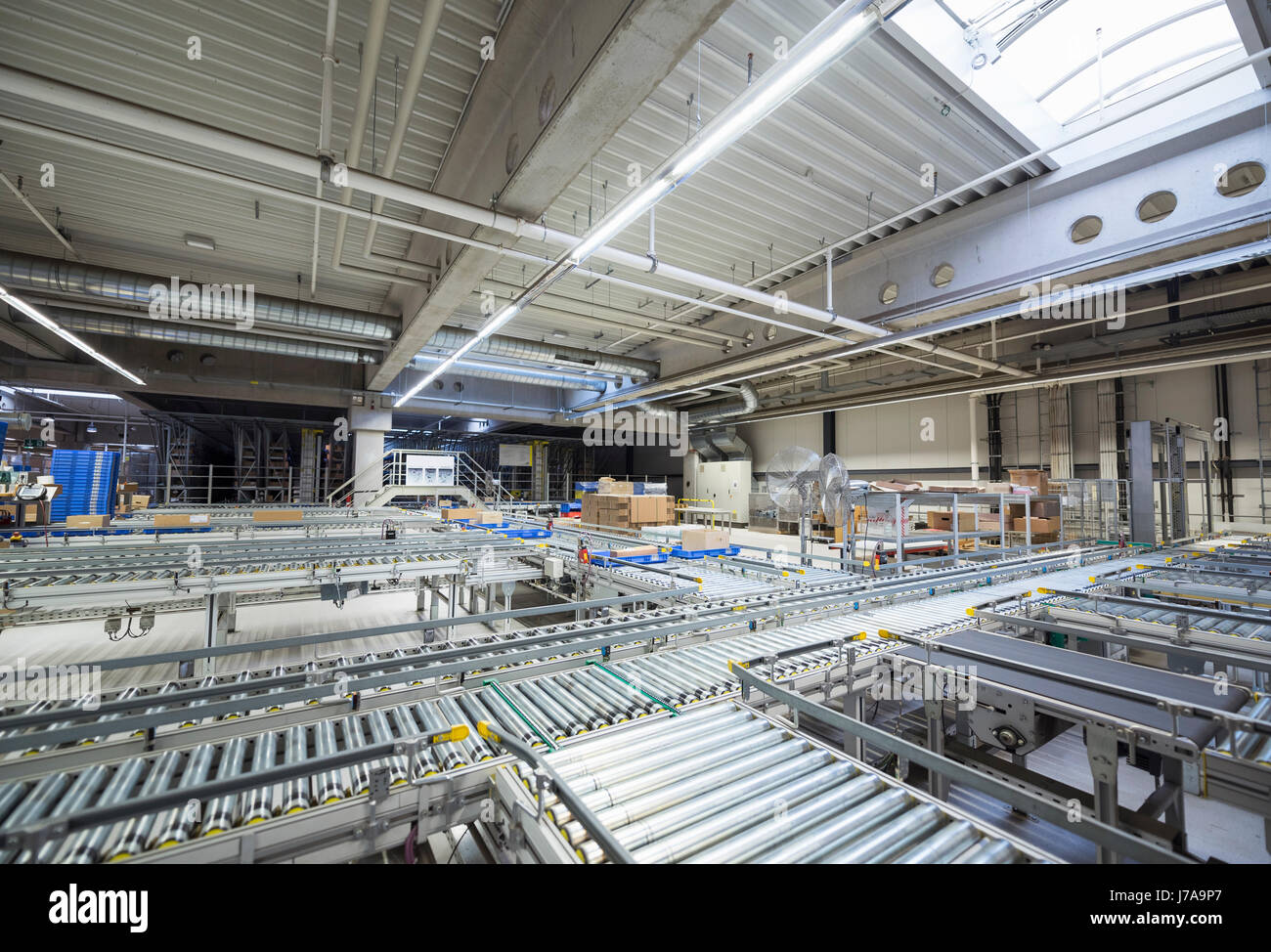 Conveyor belt in factory shop floor Stock Photo - Alamy
