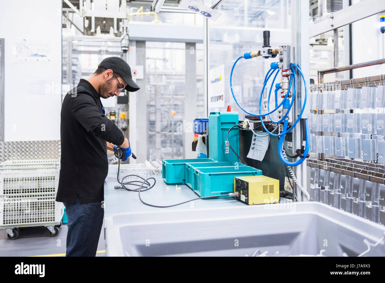 Man working in factory shop floor Stock Photo - Alamy