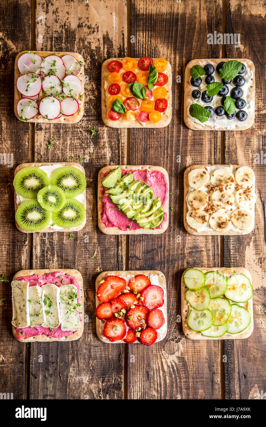 Various garnished sandwiches Stock Photo - Alamy
