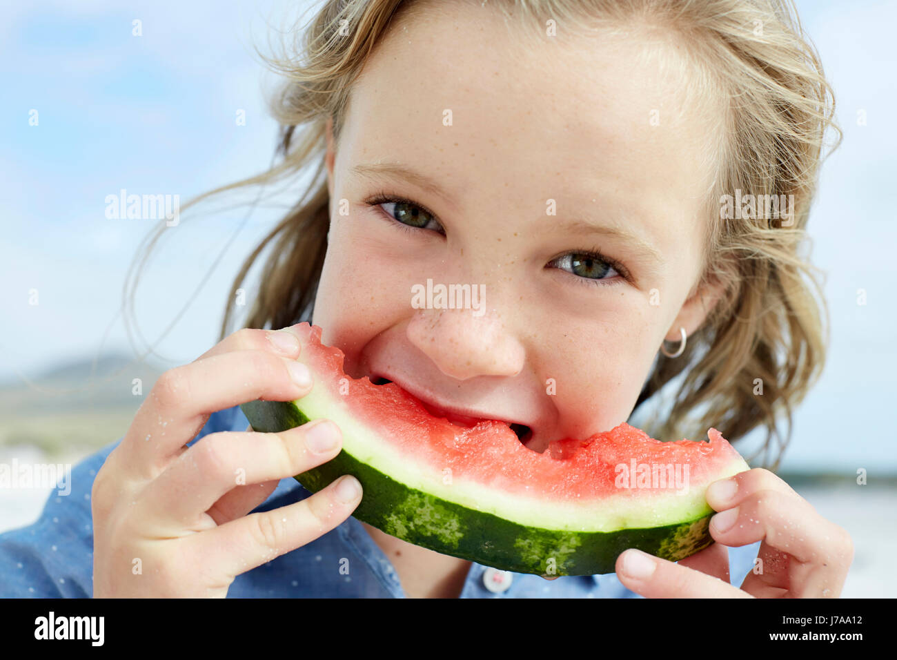 Girl eating water melon hi-res stock photography and images - Alamy