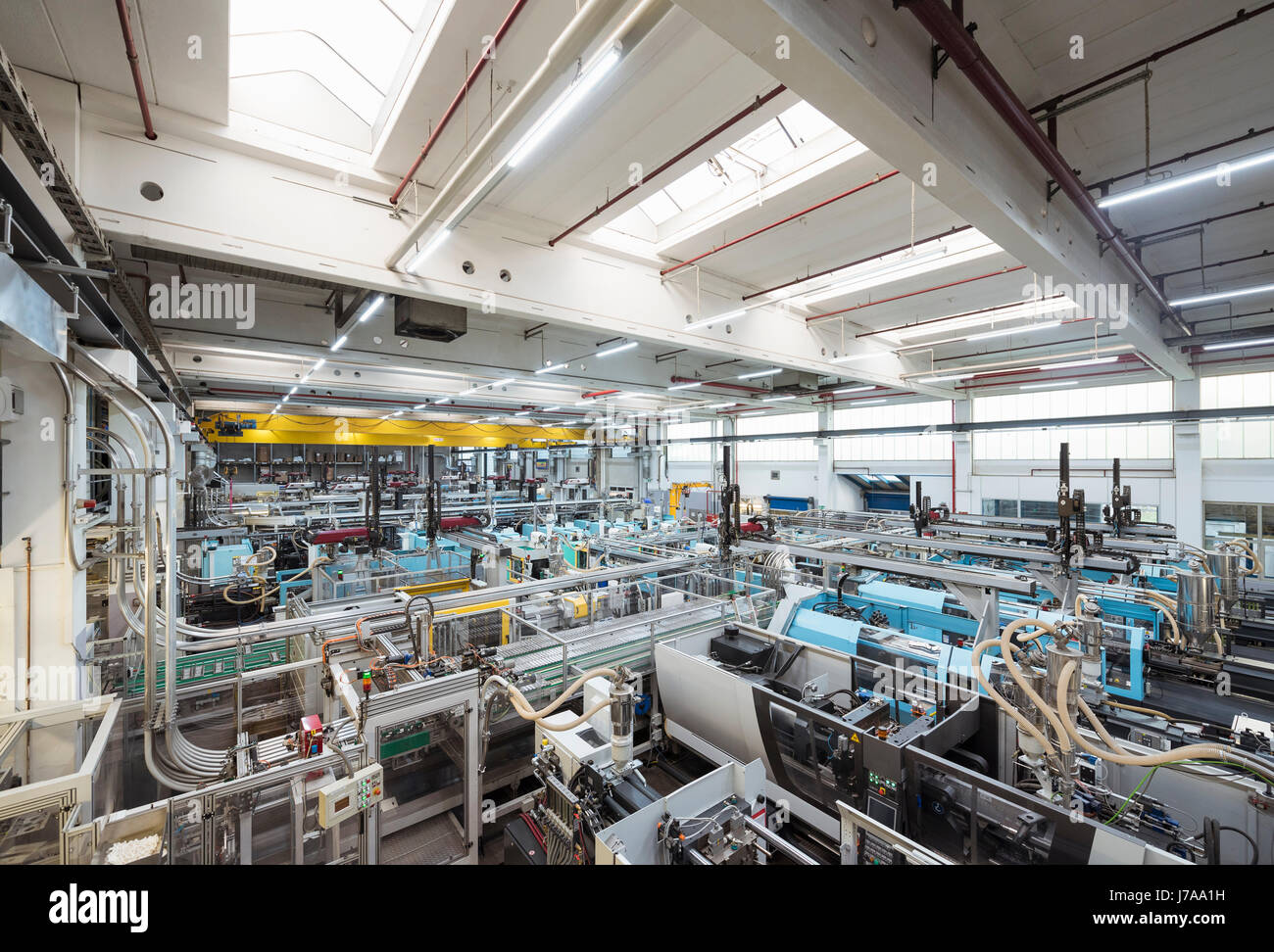 Machines on factory shop floor Stock Photo - Alamy