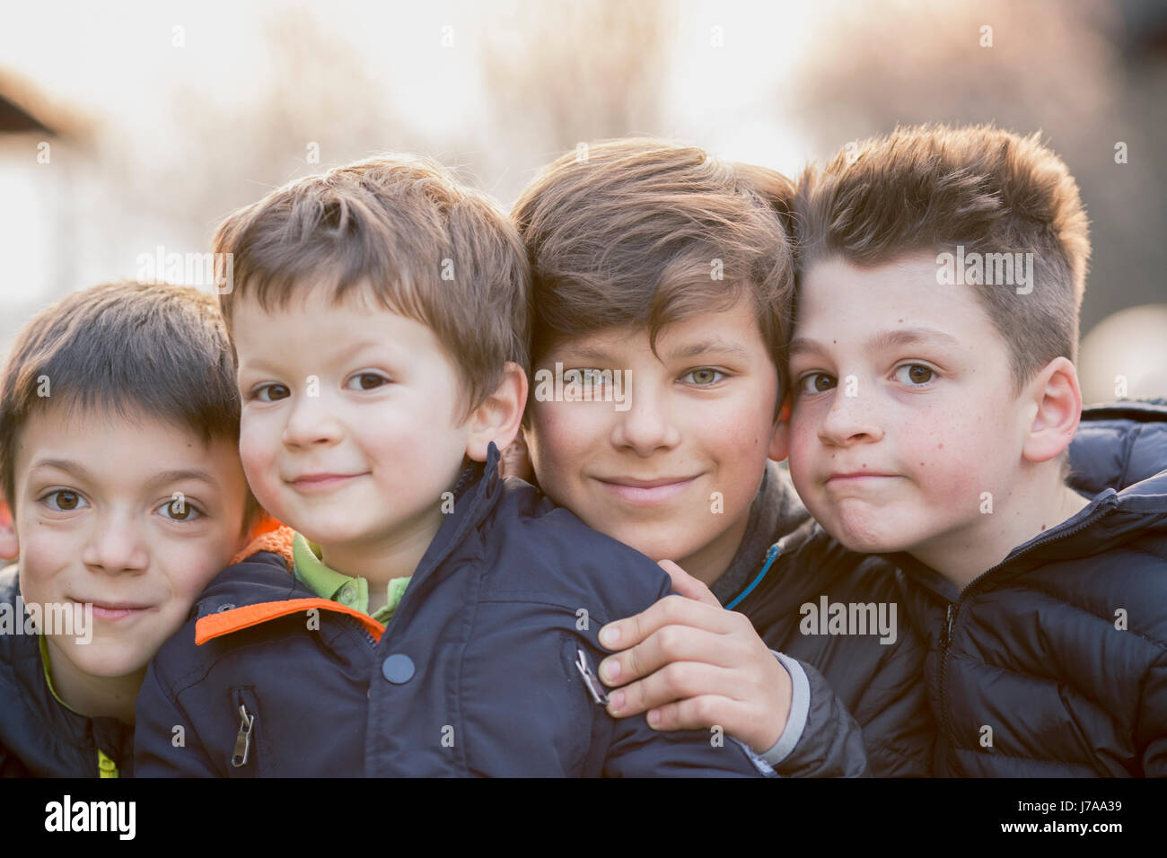 Group picture of four boys Stock Photo - Alamy