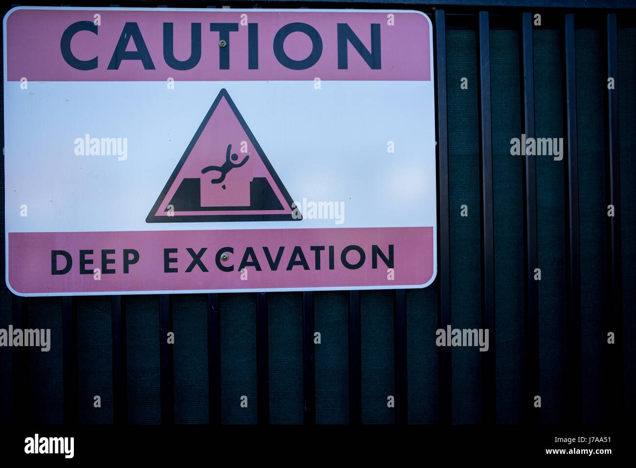 Caution deep excavation warning sign Stock Photo - Alamy