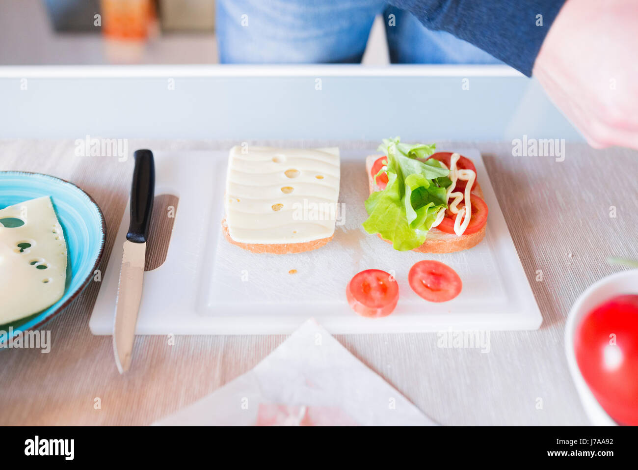 Man preparing sandwich Stock Photo - Alamy