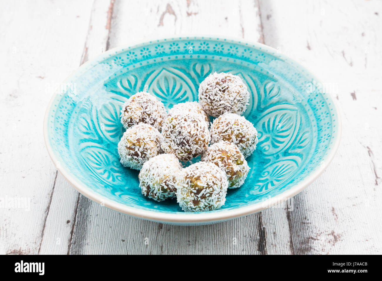 Bliss Balls with dates, pistachio, oat flakes and coconut flakes Stock ...