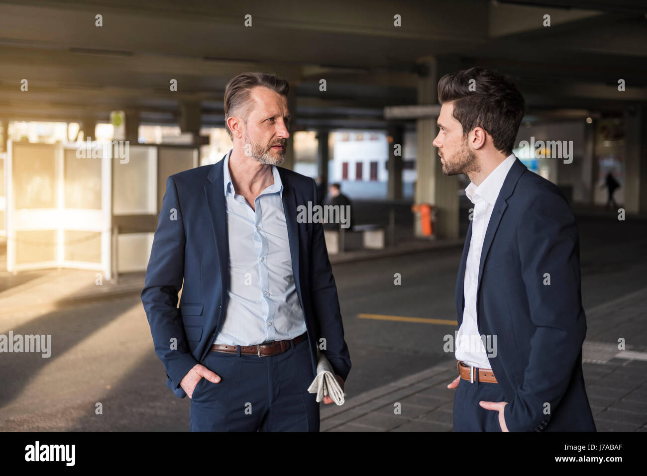 Two men talking bus hi-res stock photography and images - Alamy