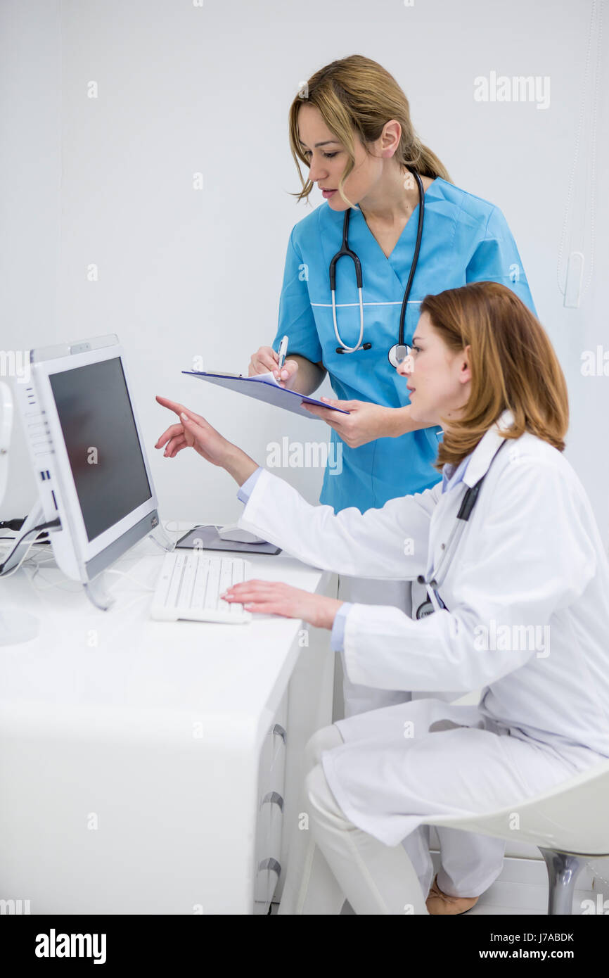 Two doctors colleagues working hi-res stock photography and images - Alamy