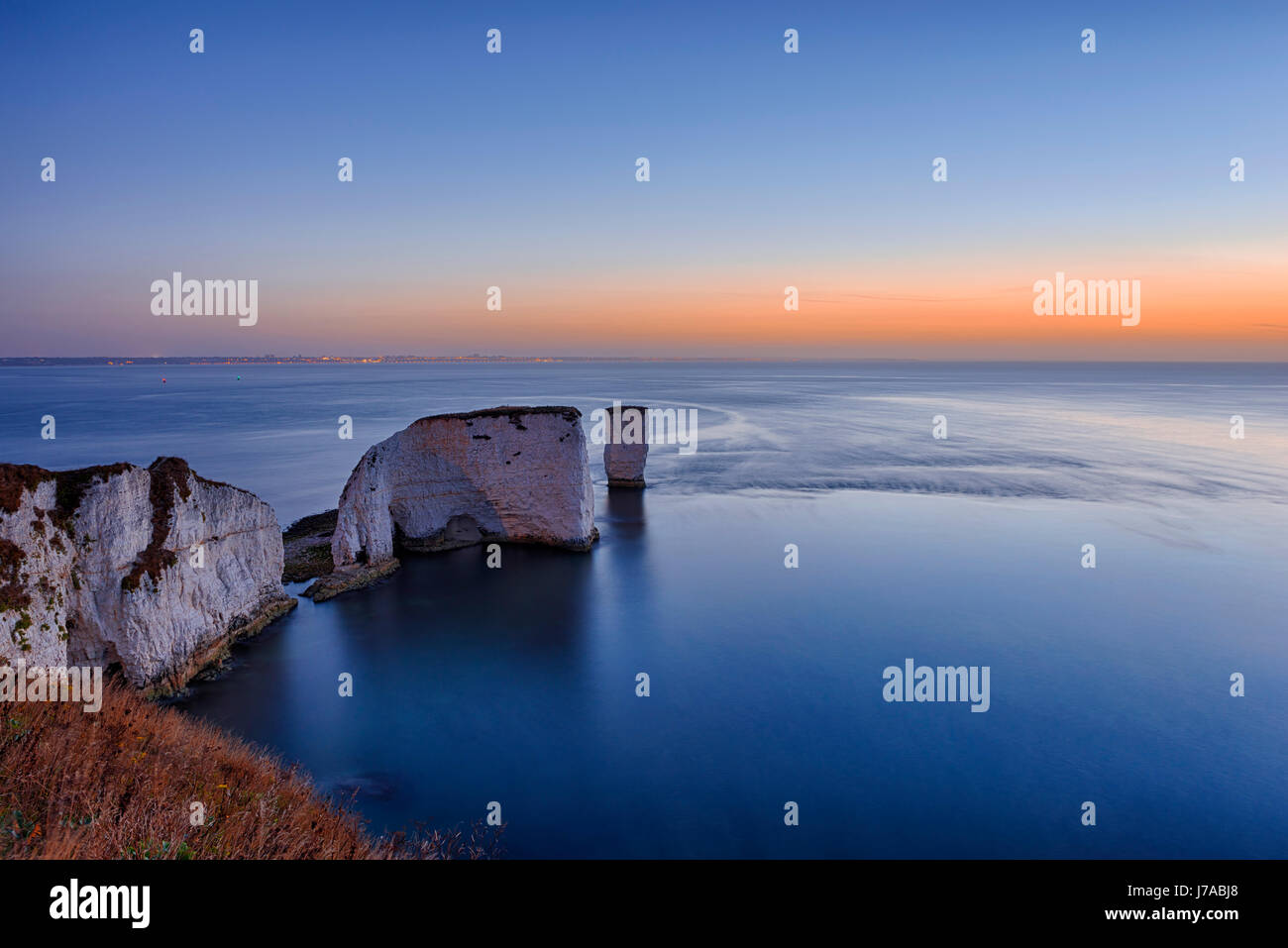 Old Harry Rocks, chalk cliffs and sea stacks, sunrise. UNESCO World ...