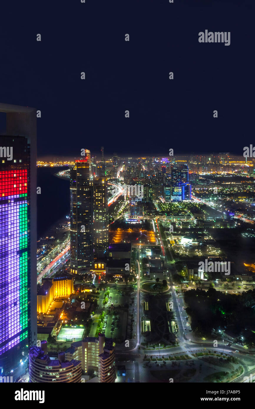UAE, skyline of Abu Dhabi at night Stock Photo - Alamy