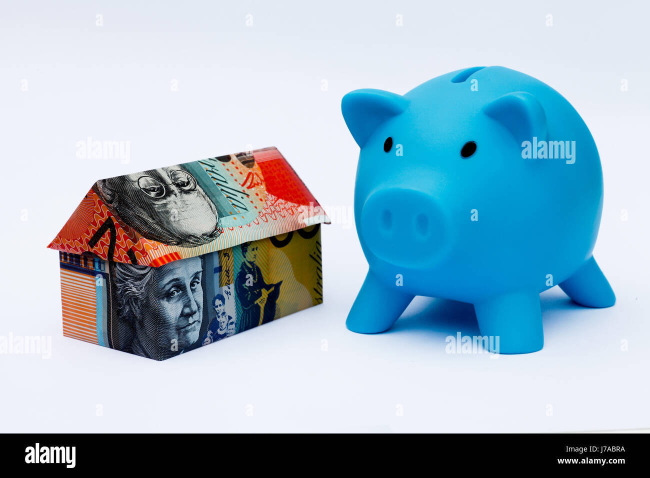 Australian Origami Money House with Piggy bank Stock Photo - Alamy