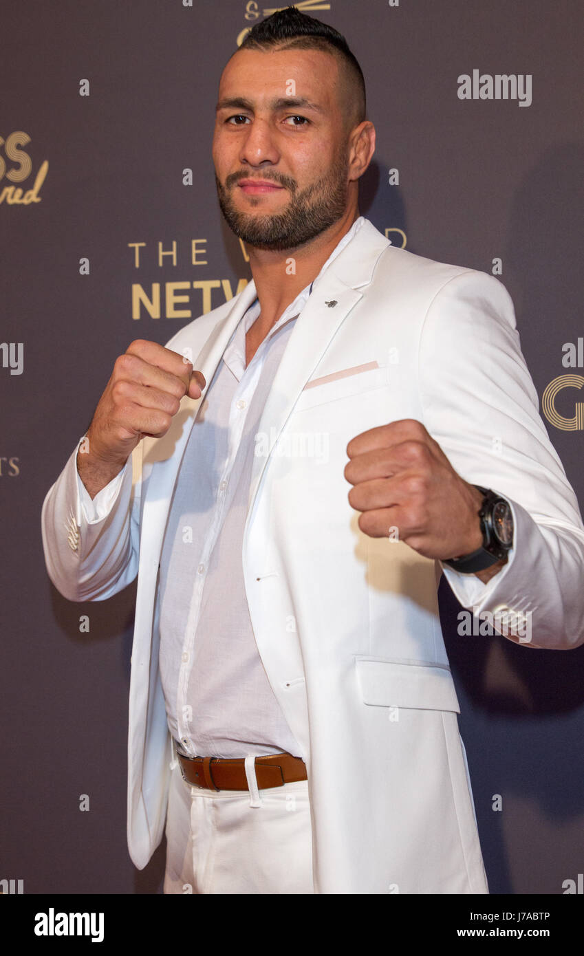 UCF MMA FIGHTER MEHDI, "THE SULTAN," BADHAD POSING ON THE RED CARPET ...