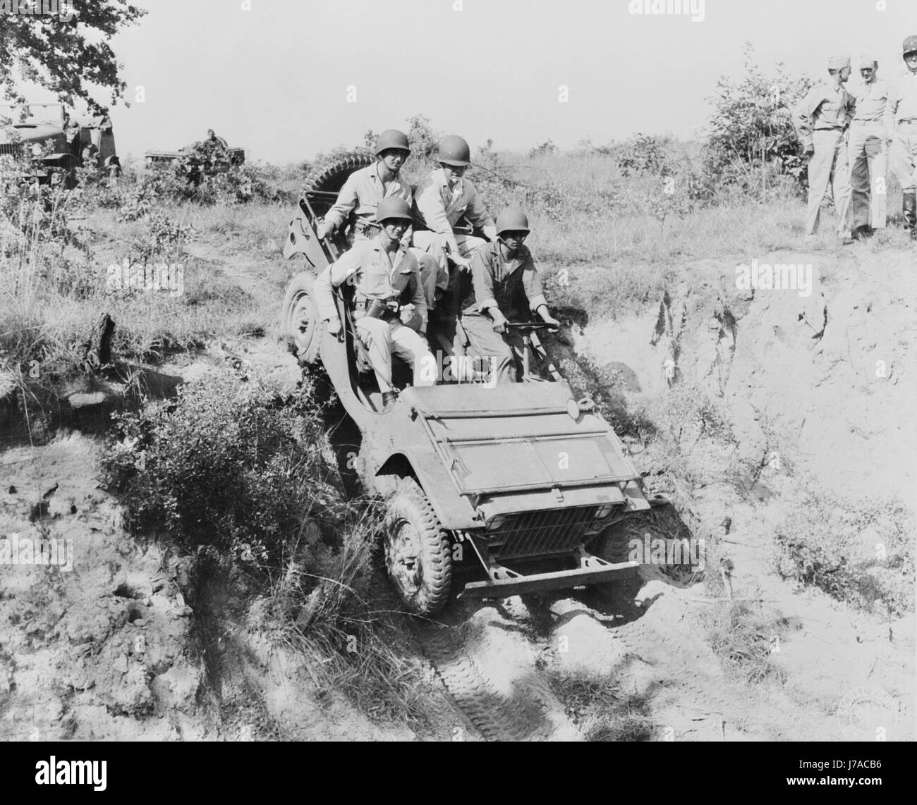 Soldier driving a jeep at Fort Benning, Georgia, circa 1942 Stock Photo ...