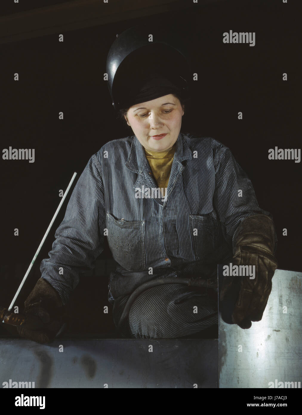 Woman welder, front view, 1943 Stock Photo - Alamy