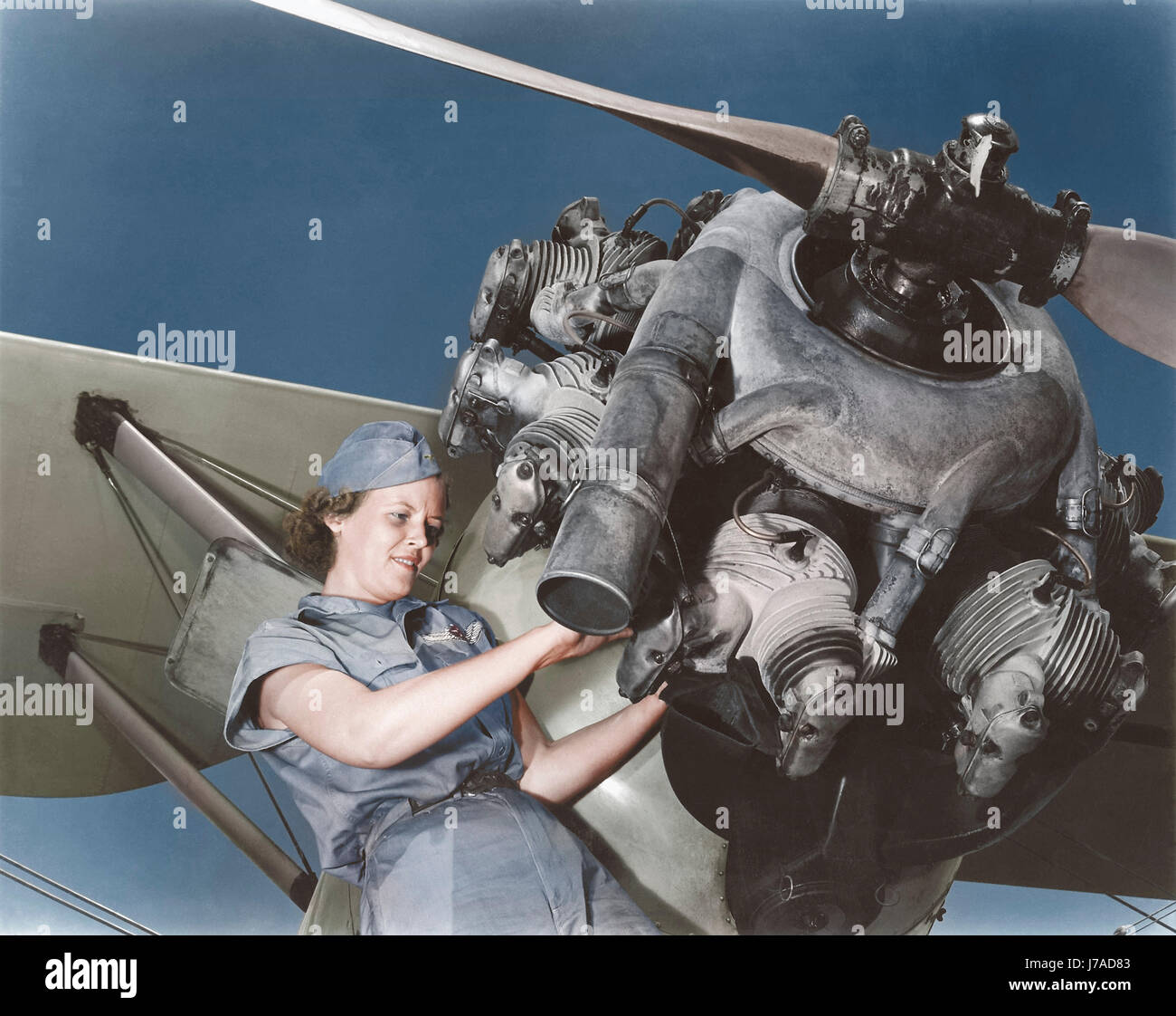 A 20 year old woman and expert aviation mechanic rebuilding an airplane ...