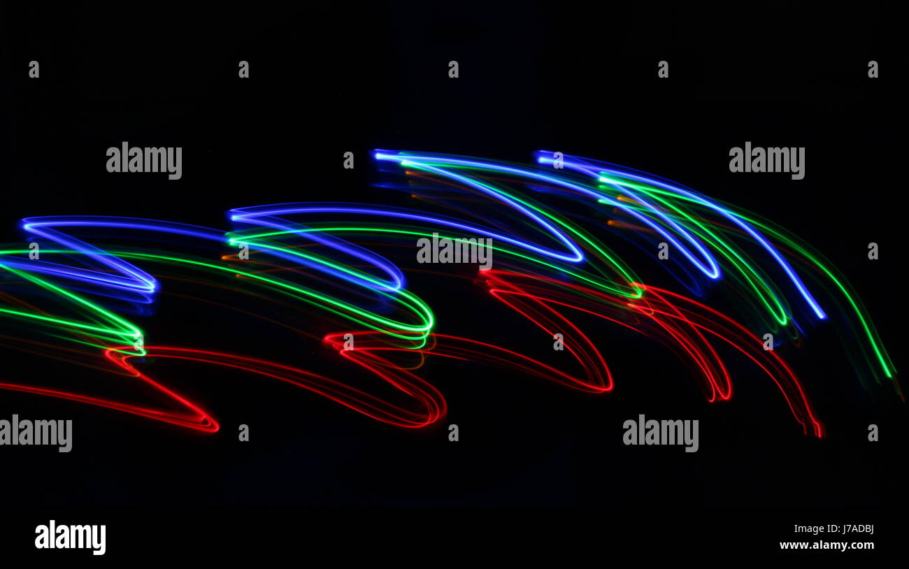 Multi colour Light Painting Photography - swirls and patterns against a ...
