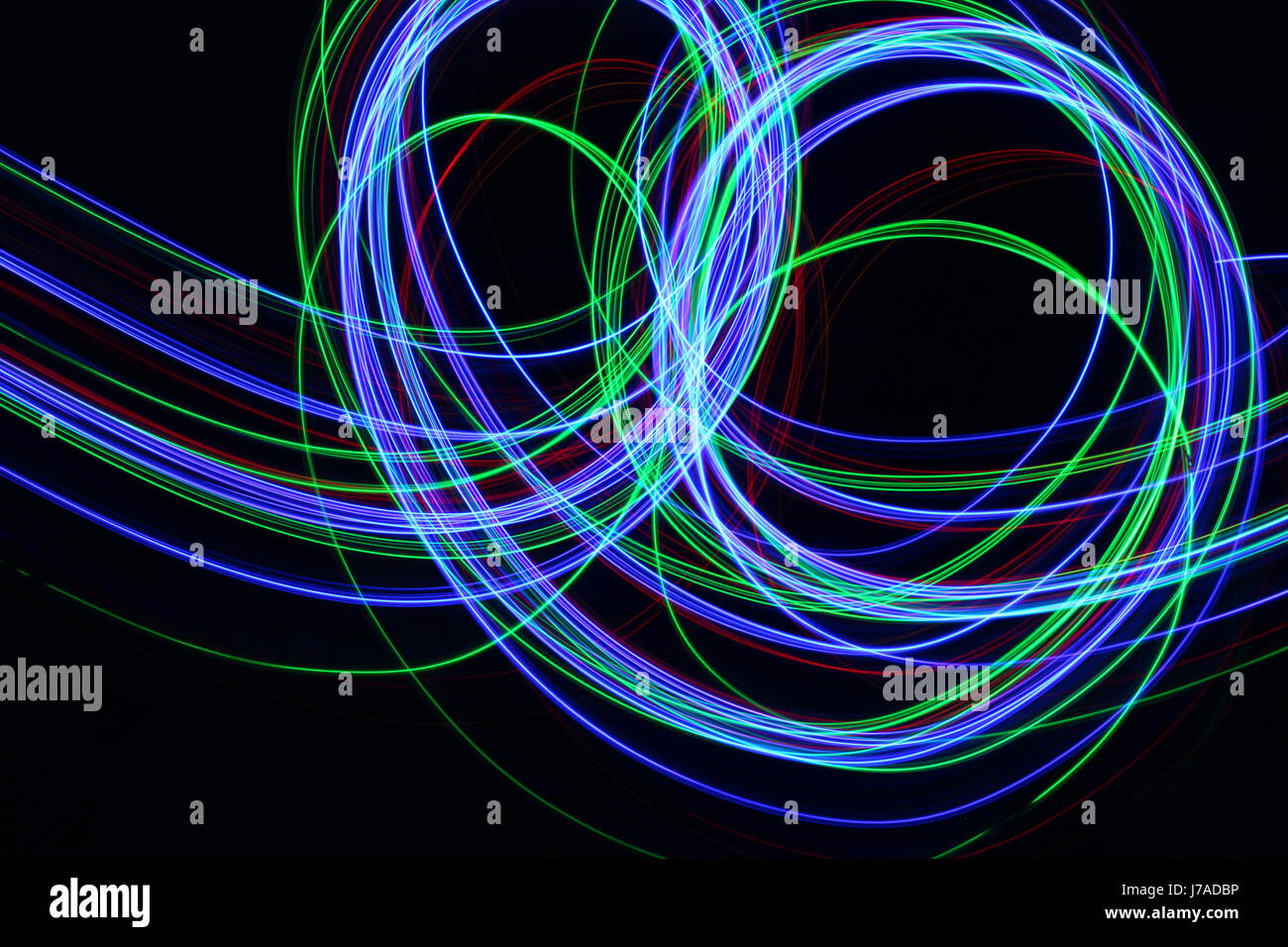 Multi colour Light Painting Photography - swirls and patterns against a ...