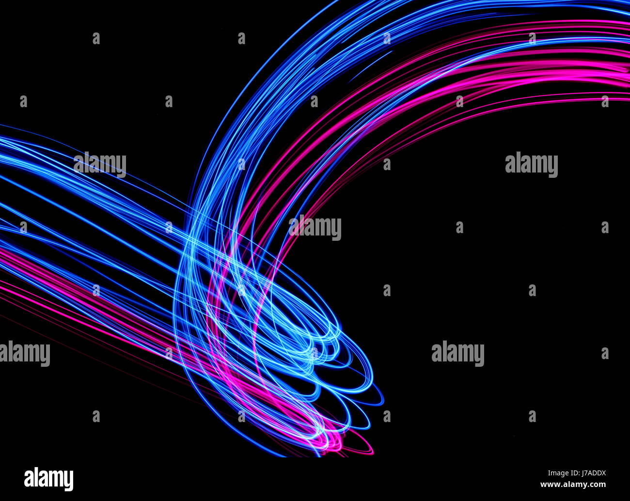 Long exposure photograph of neon pink and blue colour in an abstract ...