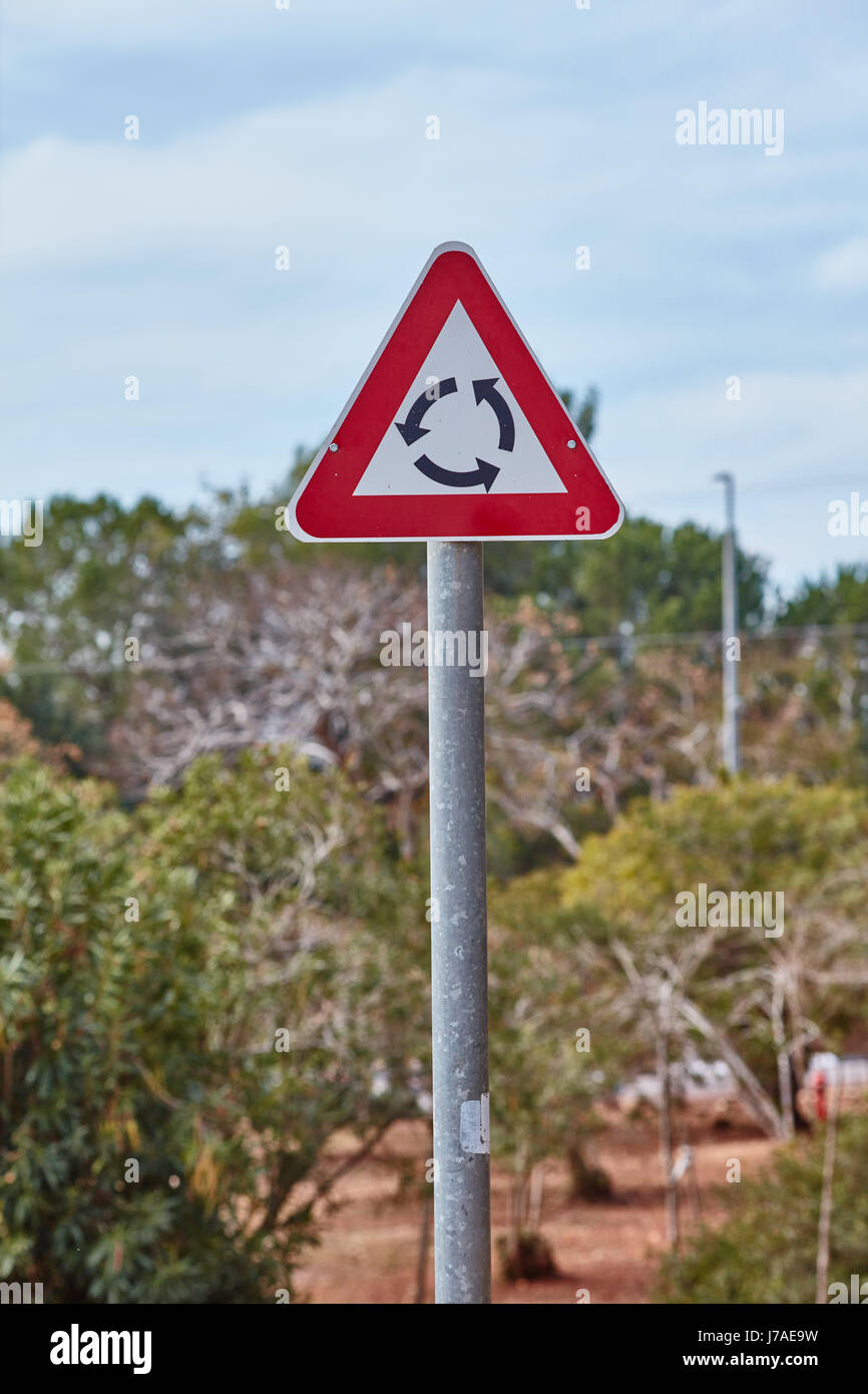 Roundabout road sign Stock Photo - Alamy
