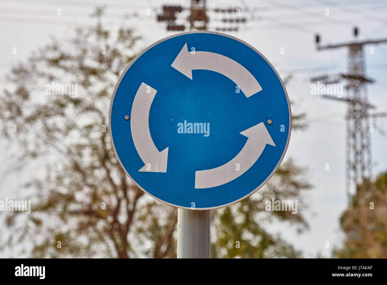 Roundabout road sign Stock Photo - Alamy