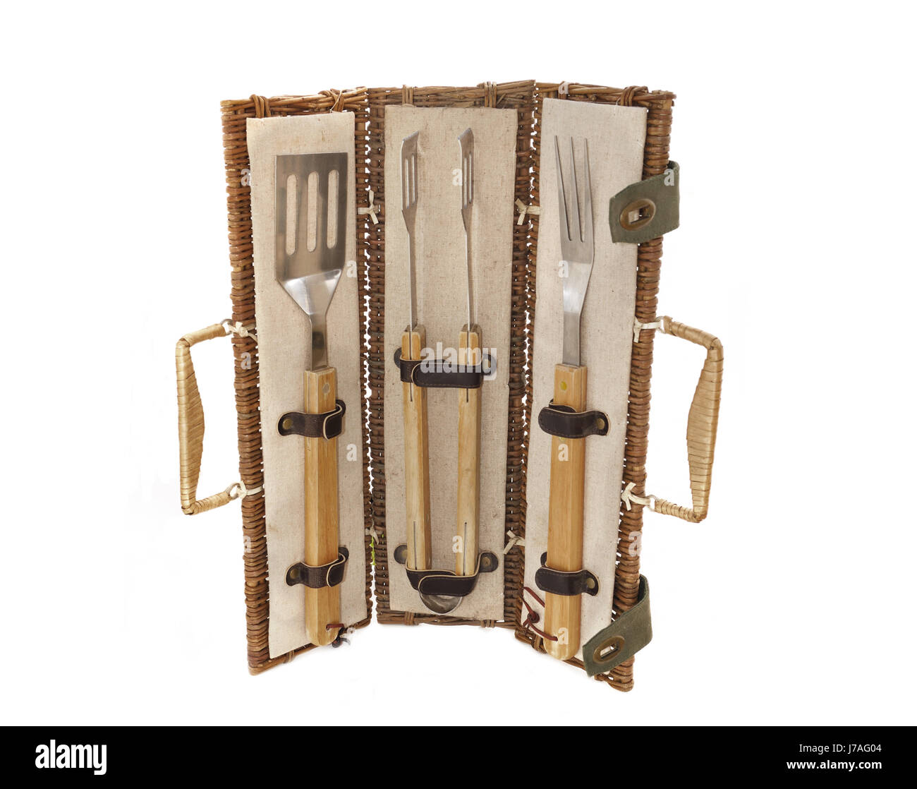 barbecue utensils store in a basket isolated on white background Stock ...