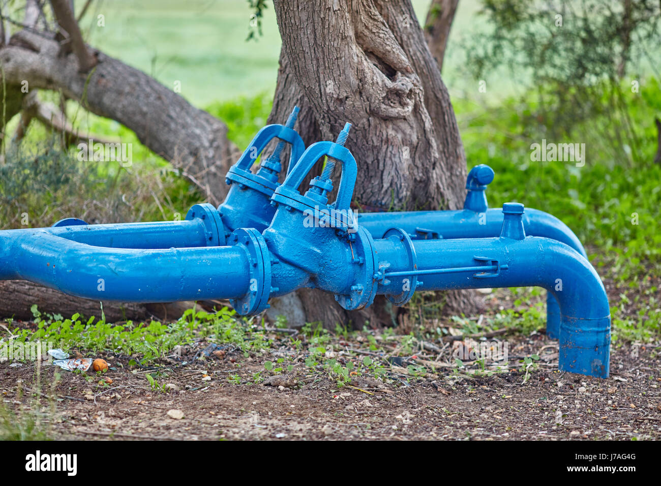 big metal pipe with nature background Stock Photo - Alamy
