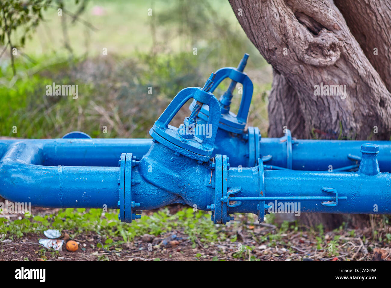 big metal pipe with nature background Stock Photo - Alamy