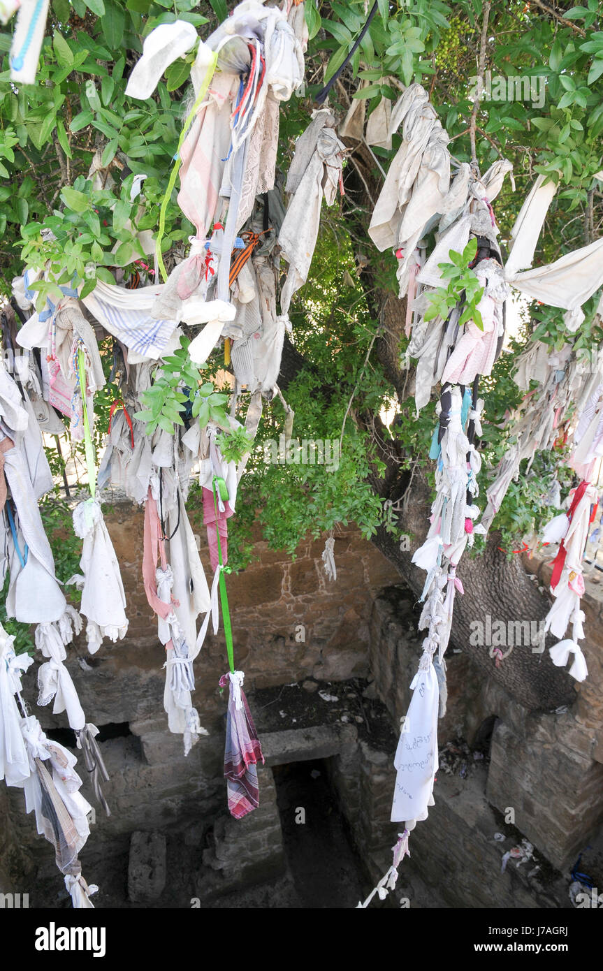 Personal offerings on the tree at Agia Solomoni Catacomb, Paphos ...