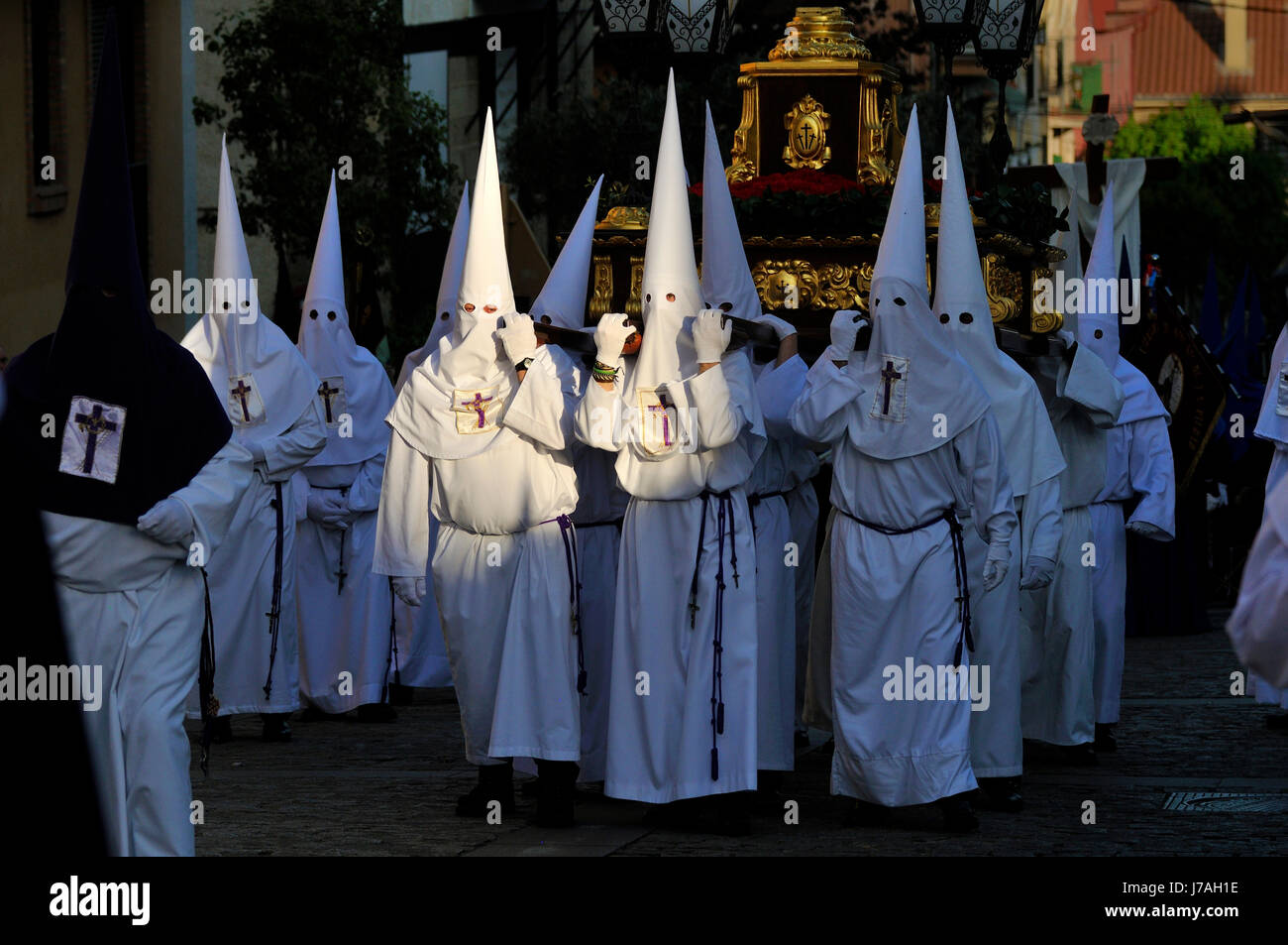 White capirote procession hi-res stock photography and images - Alamy