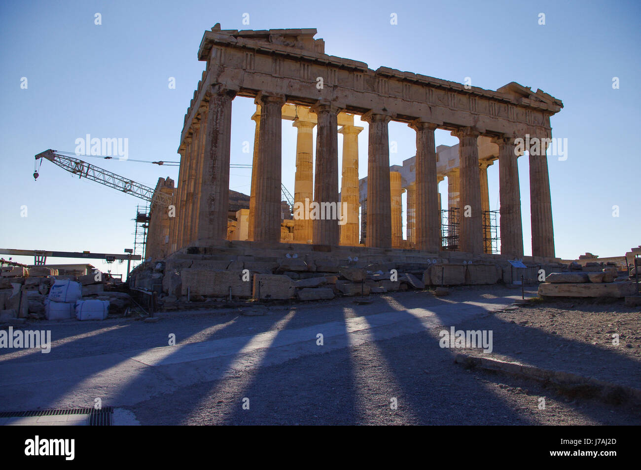 Parthenon, Acropolis casts shadows in the evening light. Construction ...