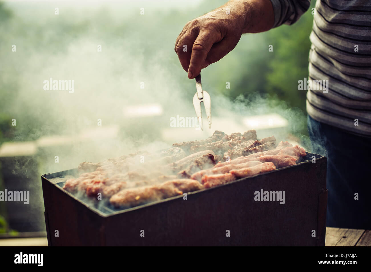 BBQ. Closeup of homemade barbecue grilling picnic in backyard outdoor ...