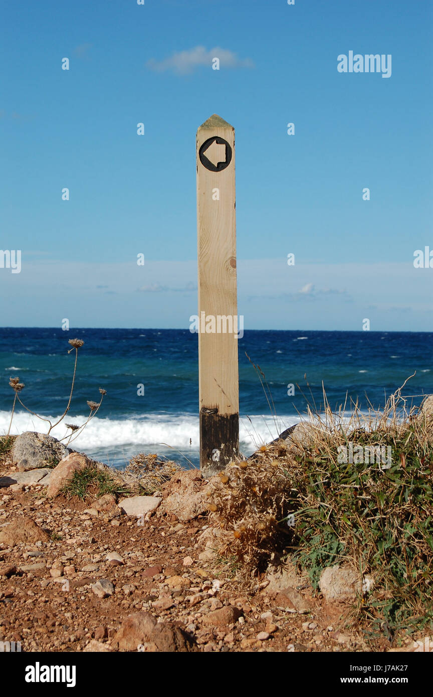 signpost at sea Stock Photo - Alamy
