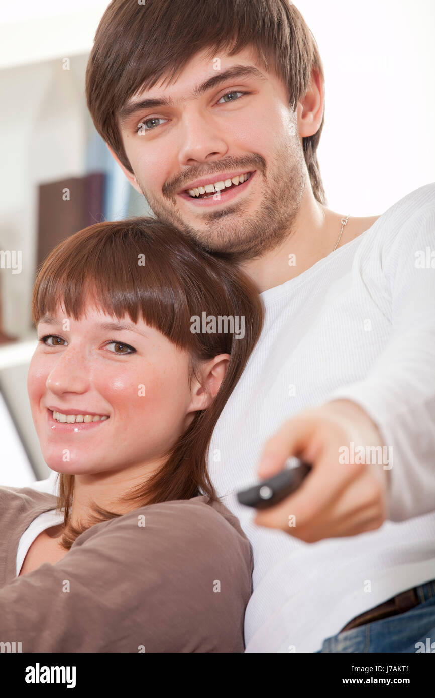 woman remote television tv televisions control couple pair watching ...