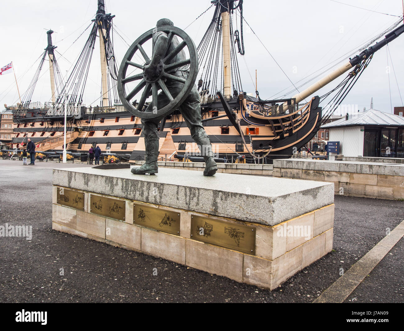 The sculpture of a Royal Navy Field Gunner carrying a wheel at ...