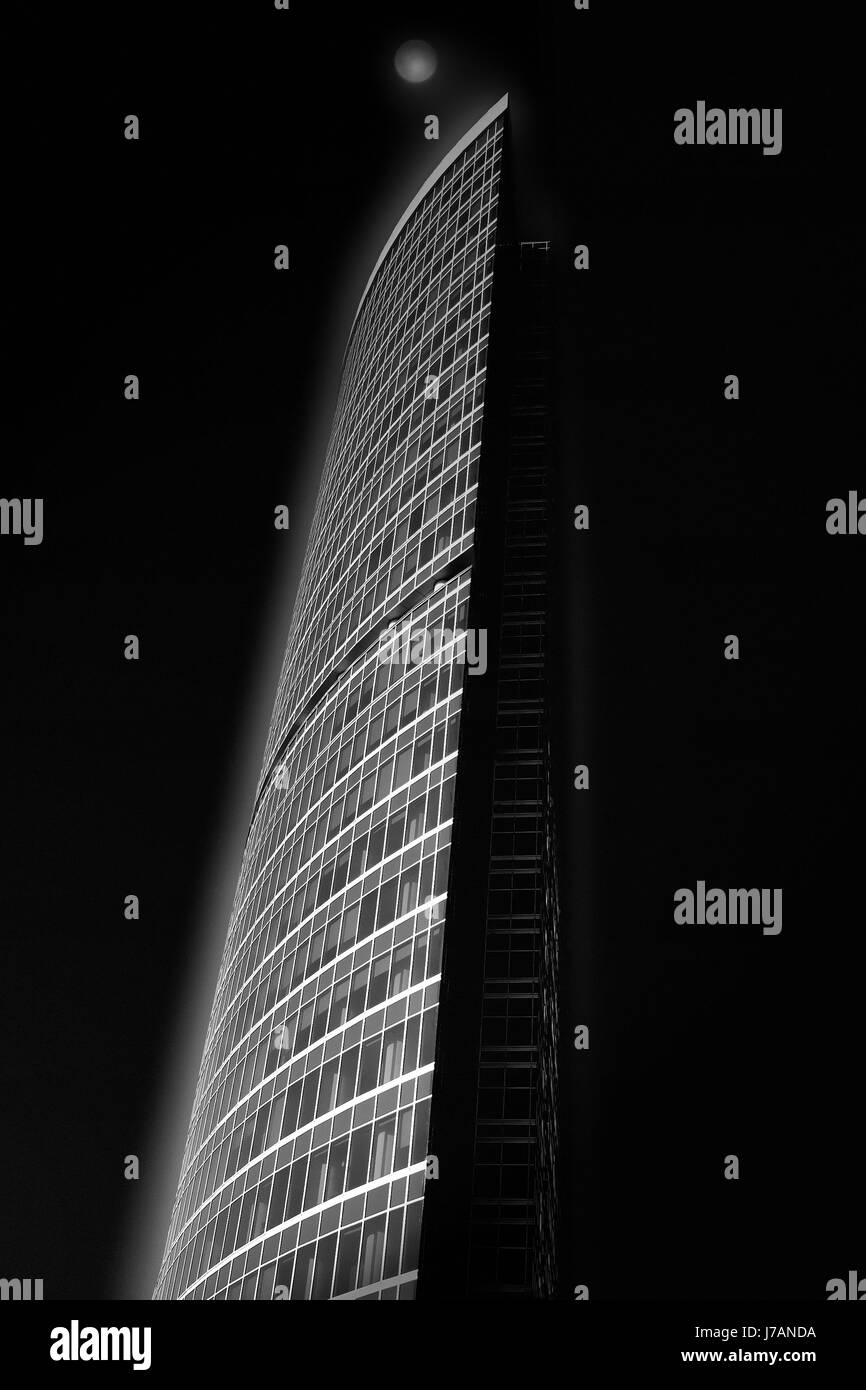 Twilight moon over city Black and White Stock Photos & Images - Alamy