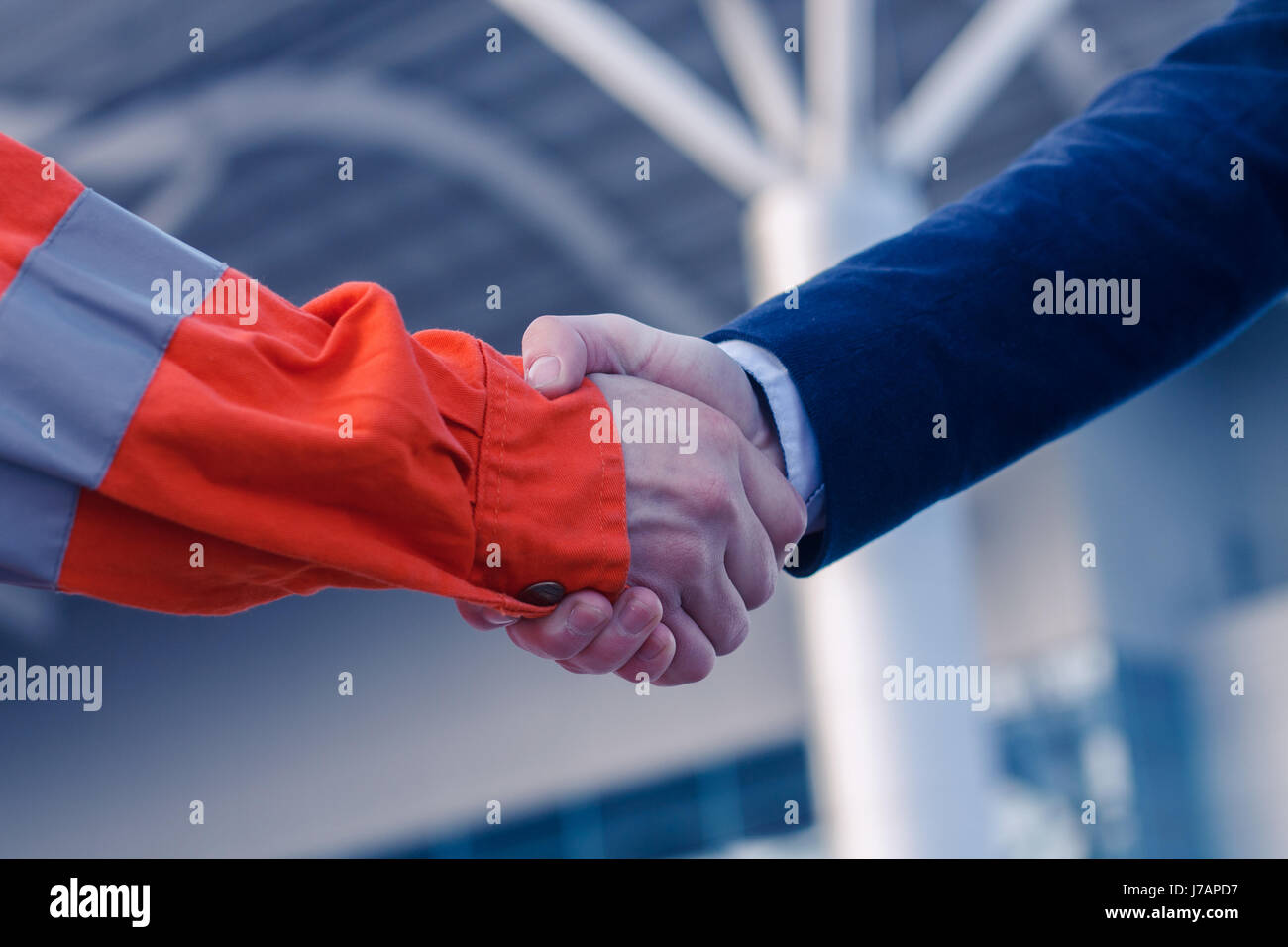 Handshake and corporate building hi-res stock photography and images ...