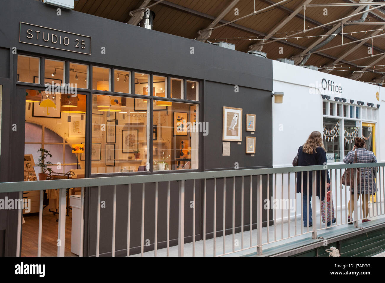 Gallery and people viewing an exhibition Stock Photo - Alamy