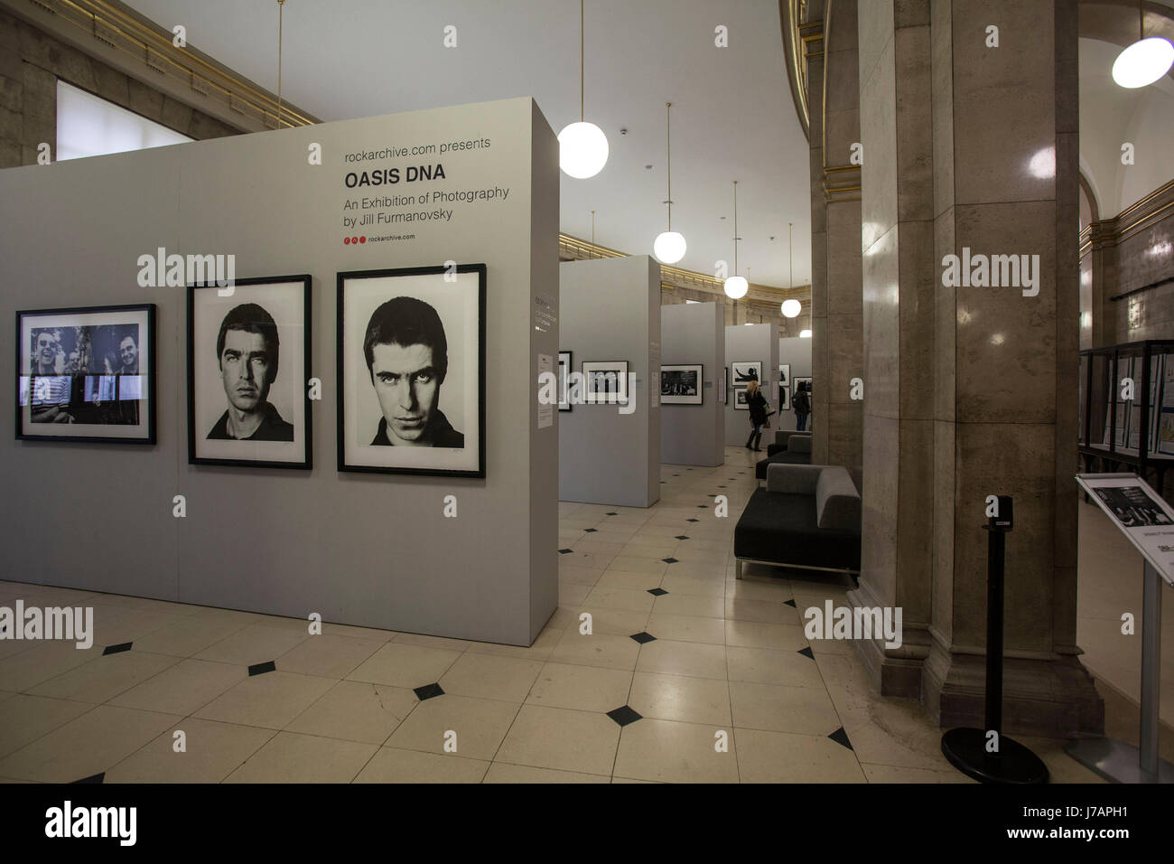 Gallery and people viewing an exhibition Stock Photo - Alamy