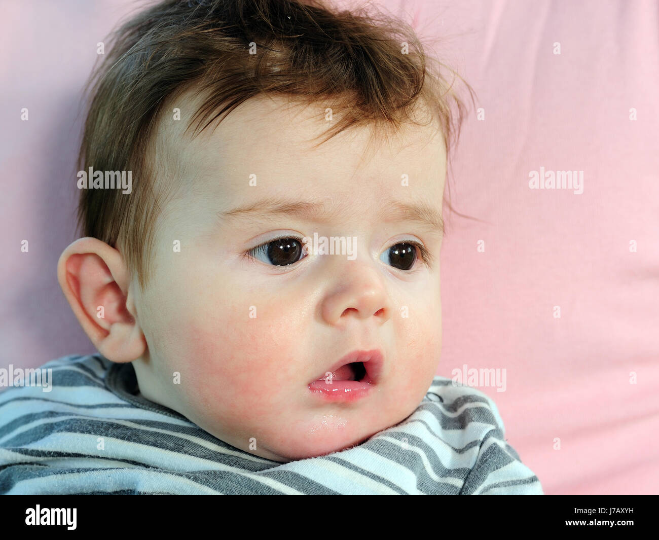 Infant looking in wonder hi-res stock photography and images - Alamy