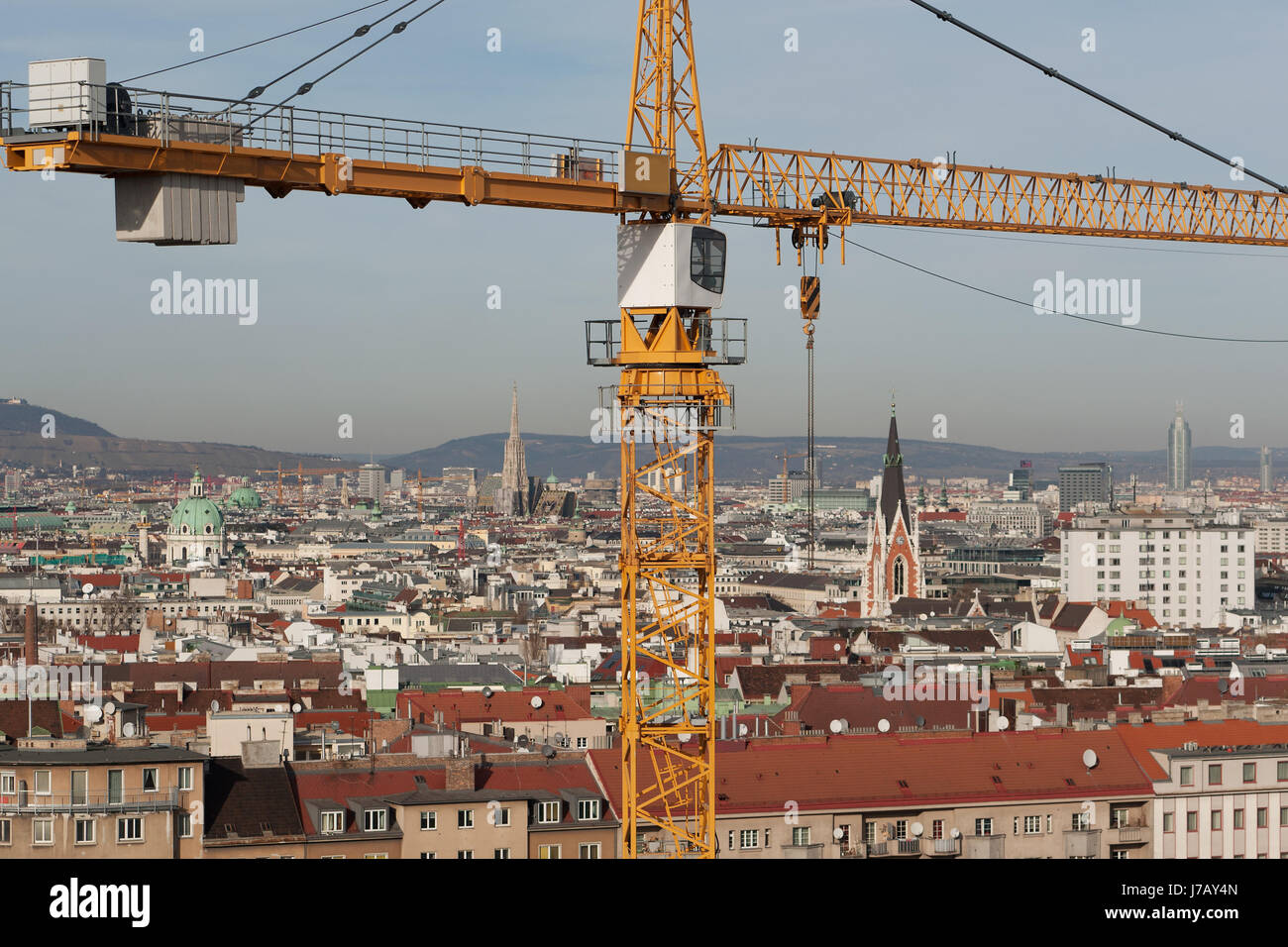 crane high up construction site Stock Photo - Alamy